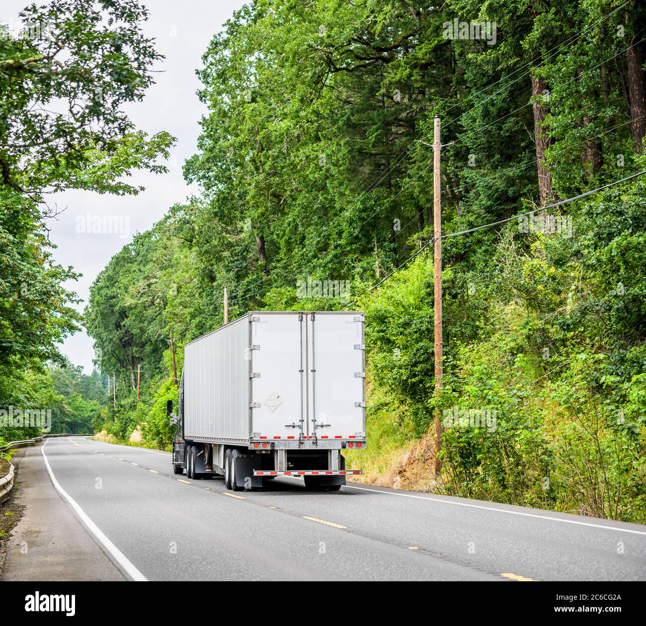 Gray bonnet big rig long hauler industrial semi truck transporting ...