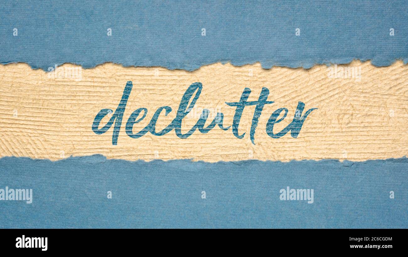 declutter - motivational handwriting on a handmade textured paper ...