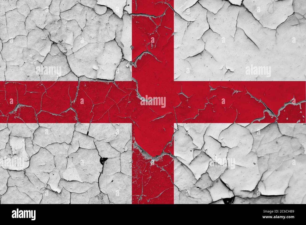 England flag close up grungy, damaged and scratched on wall peeling off ...