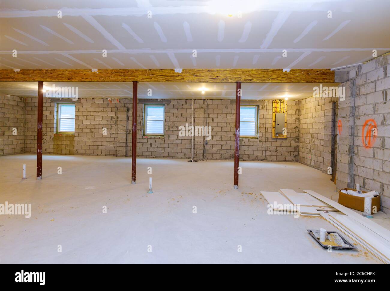 New residential construction home framing with basement unfinished view ...