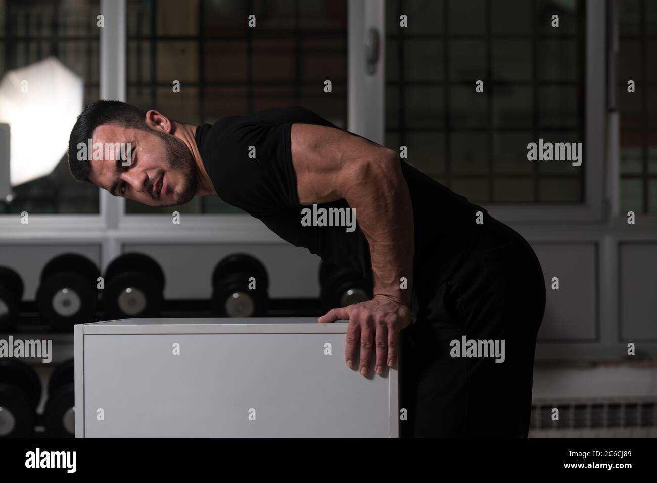 Muscular Fitness Bodybuilder Doing Heavy Weight Exercise For Triceps On ...