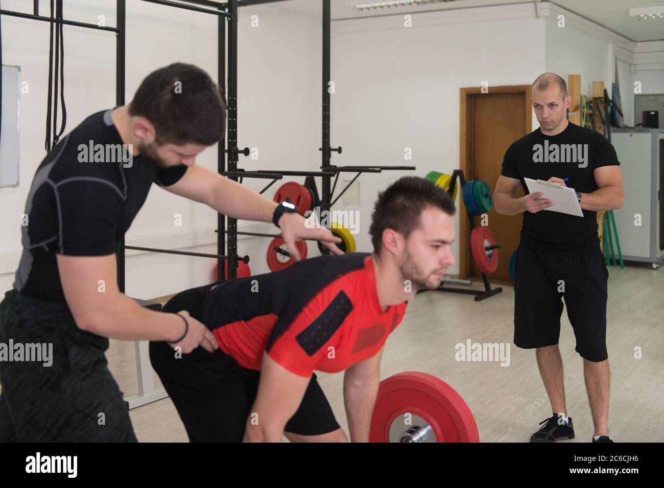 Gym Group Weight Lifting Workout Men and Girls Exercise Stock Photo - Alamy