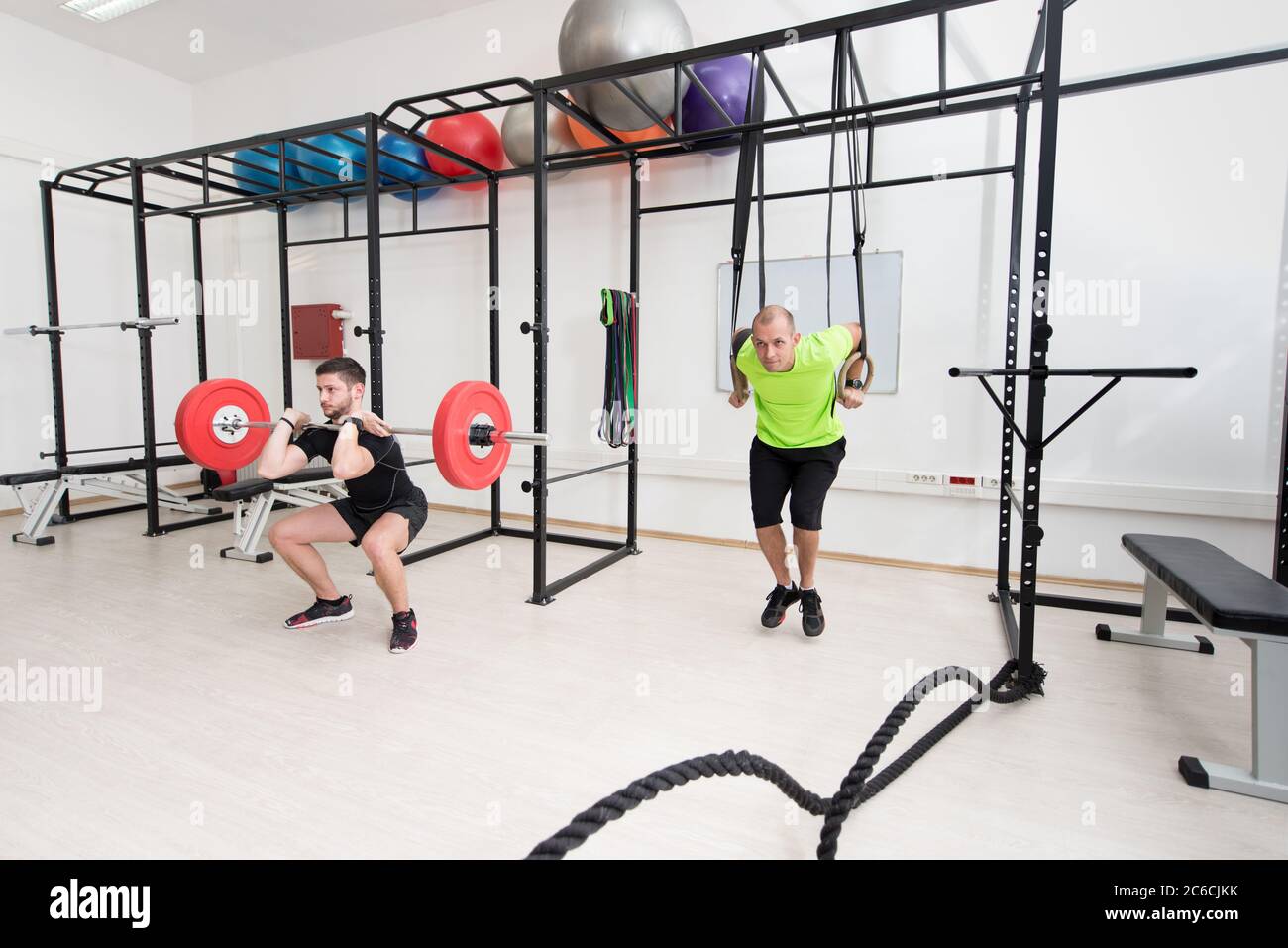 Gym Group Weight Lifting Workout Men and Girls Exercise Stock Photo - Alamy