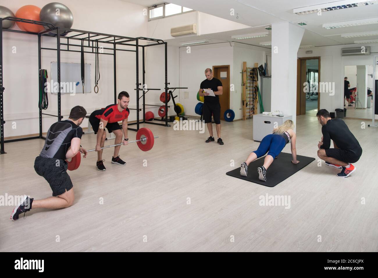Group young sporting adults hi-res stock photography and images - Alamy