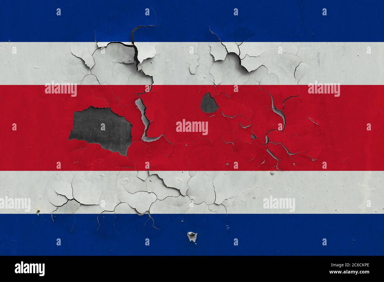 Costa Rica flag close up old, damaged and dirty on wall peeling off ...