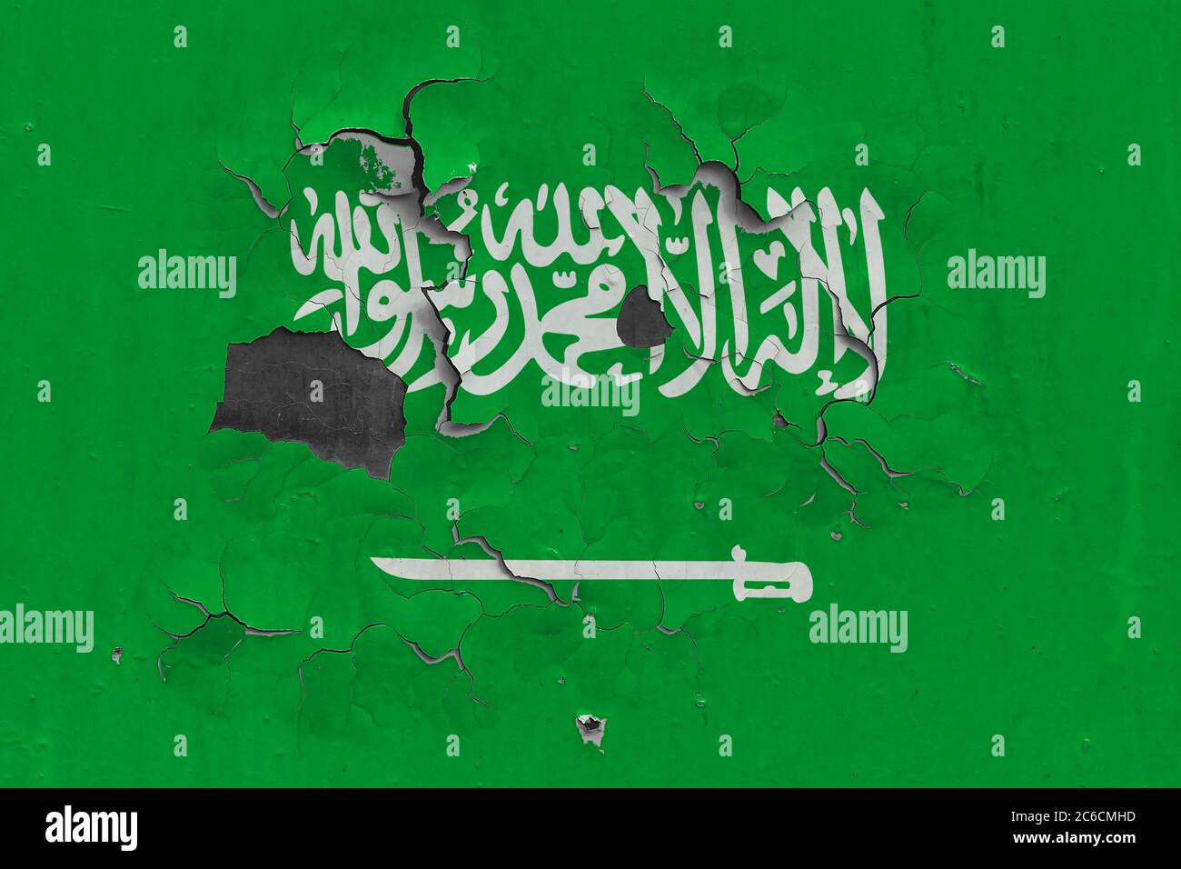 Saudi Arabia flag close up old, damaged and dirty on wall peeling off ...