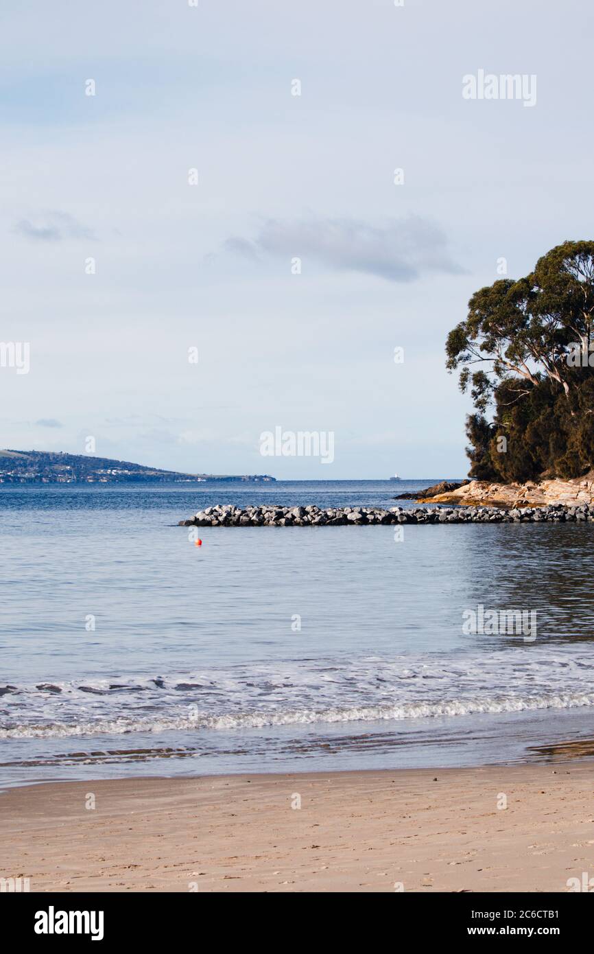 beautiful Tasmanian beach landscape with calm serene ocean shot in ...