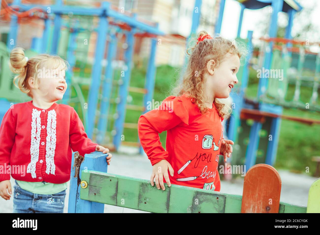 children play on the Playground run and have fun Stock Photo - Alamy