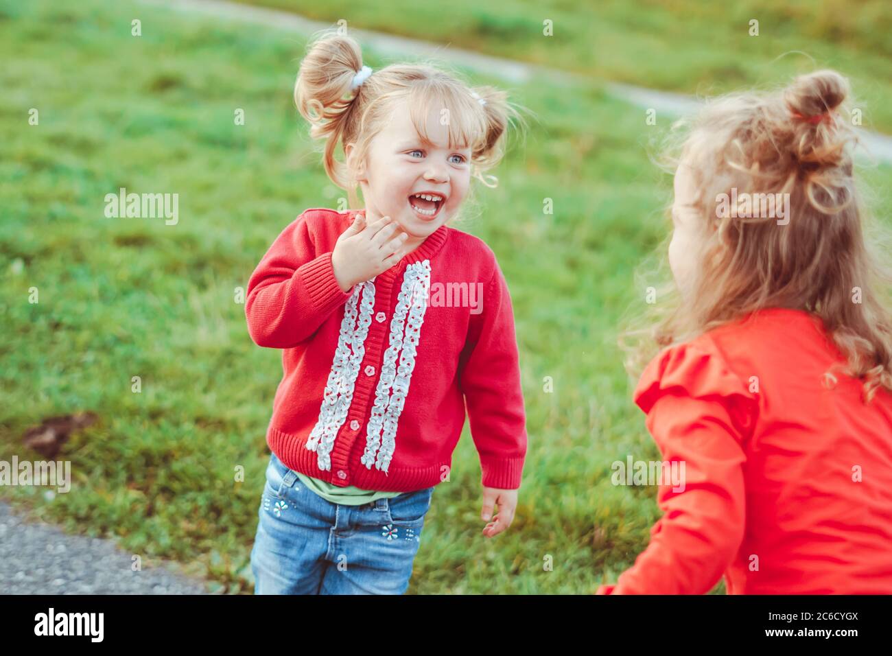 children play on the Playground run and have fun Stock Photo - Alamy