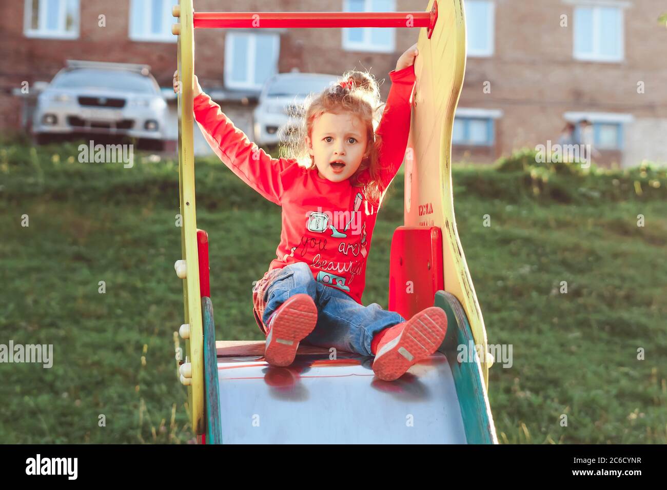 Slide playground teacher hi-res stock photography and images - Alamy