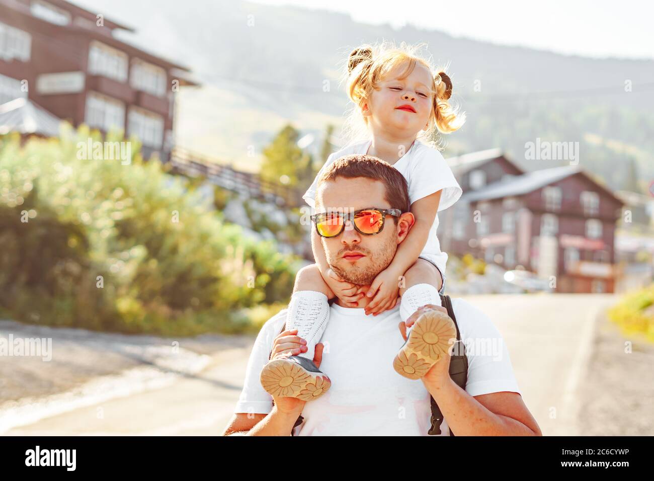 happy family with a child while traveling walking on the street Stock ...