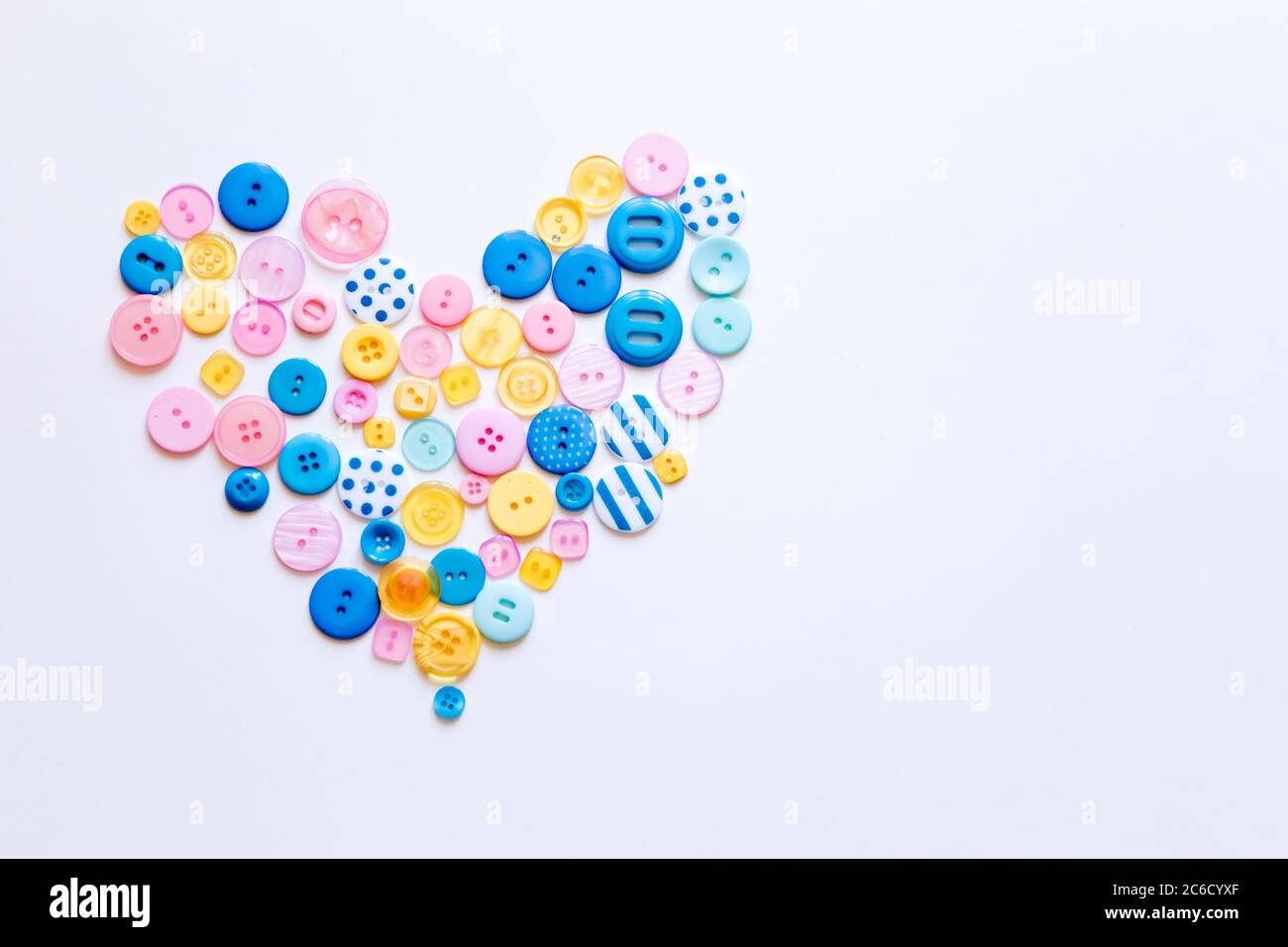 Flat lay with colorful sewing buttons, mock up, top view Stock Photo ...