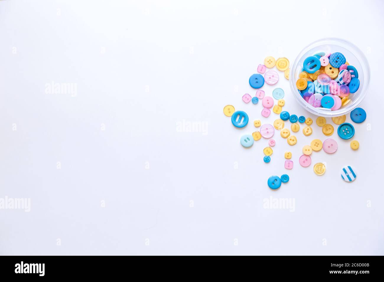 Flat lay with colorful sewing buttons, mock up, top view Stock Photo ...