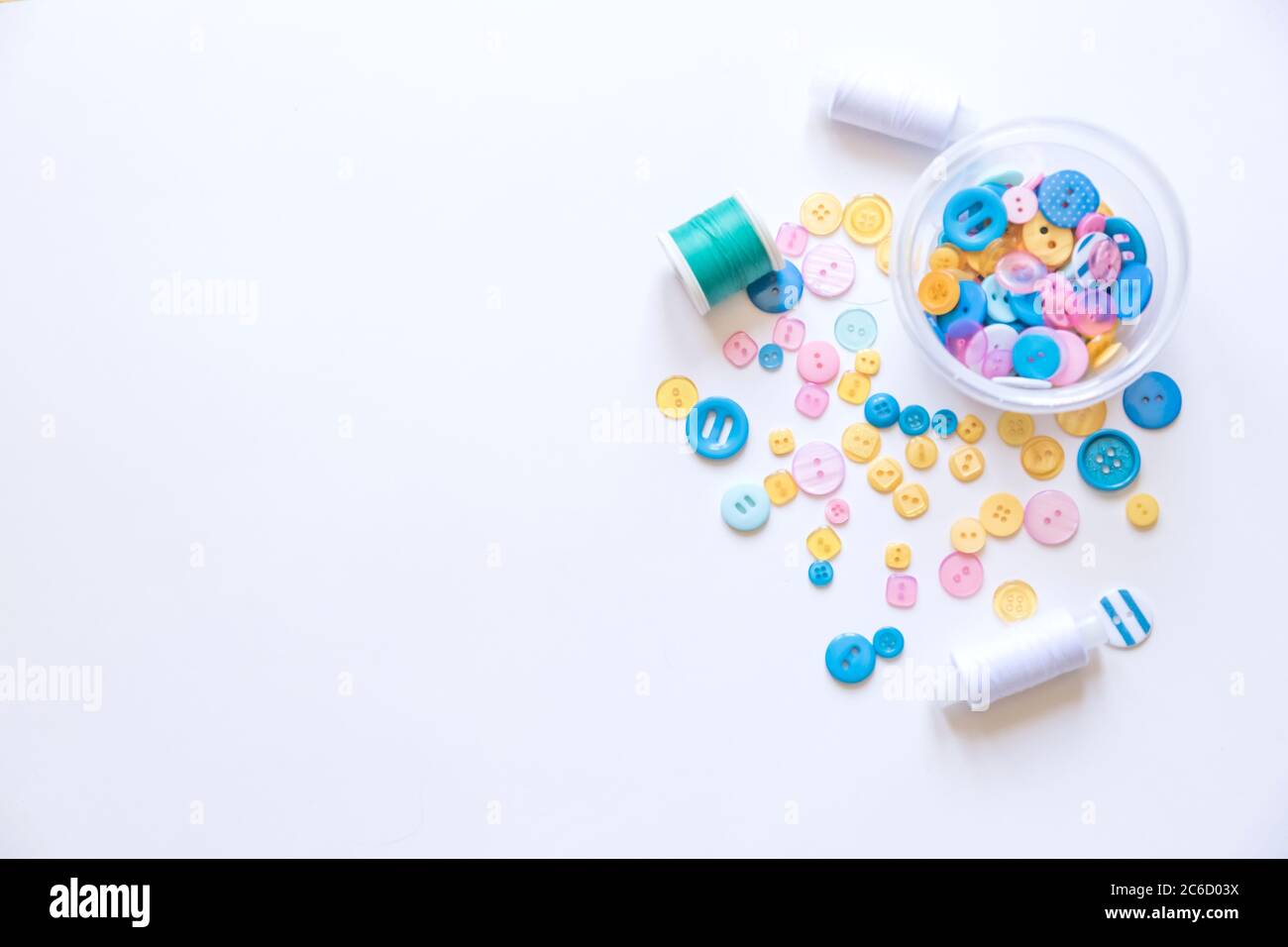 Flat lay with colorful sewing buttons, mock up, top view Stock Photo ...