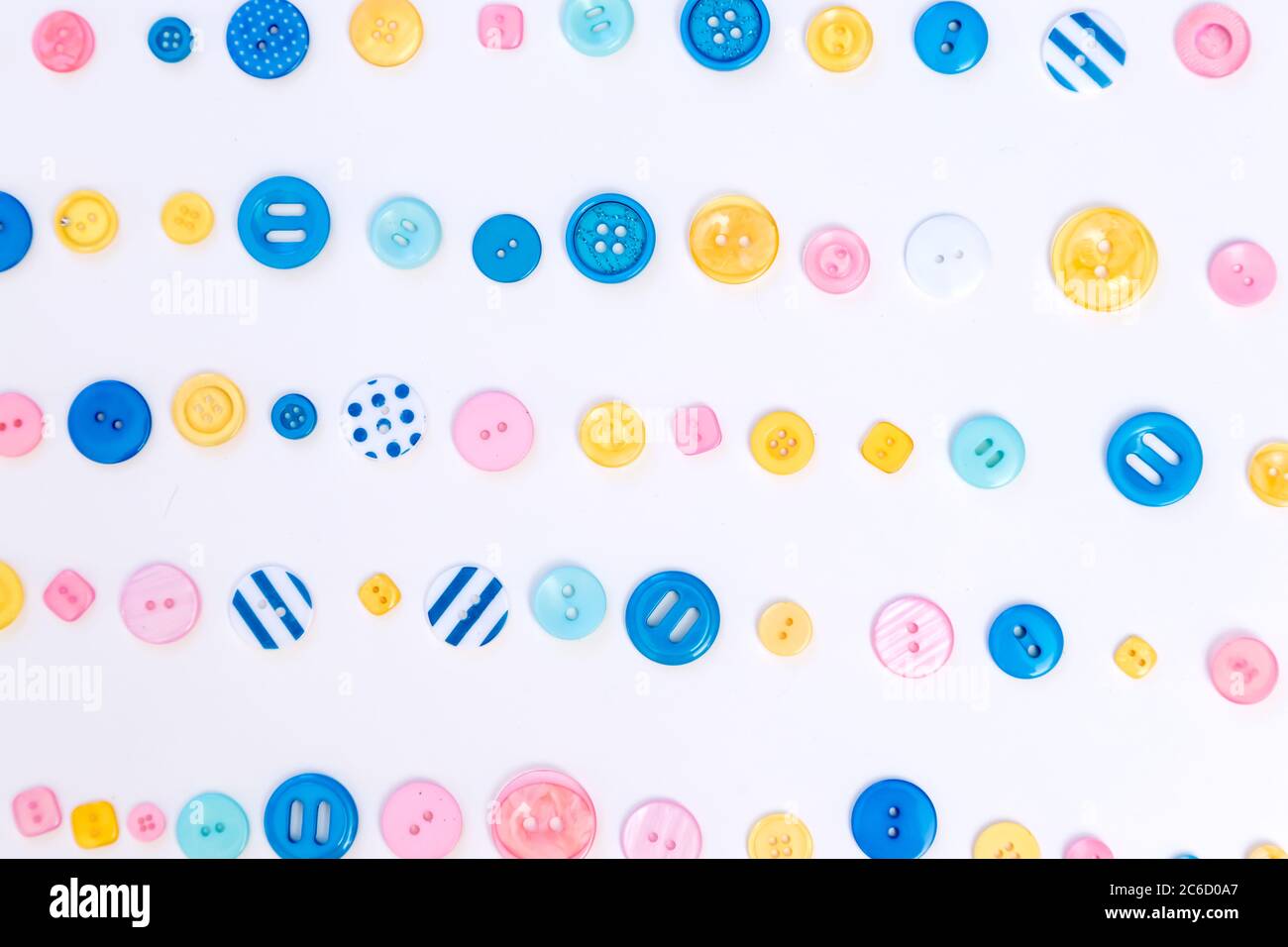 Flat lay with colorful sewing buttons, mock up, top view Stock Photo ...