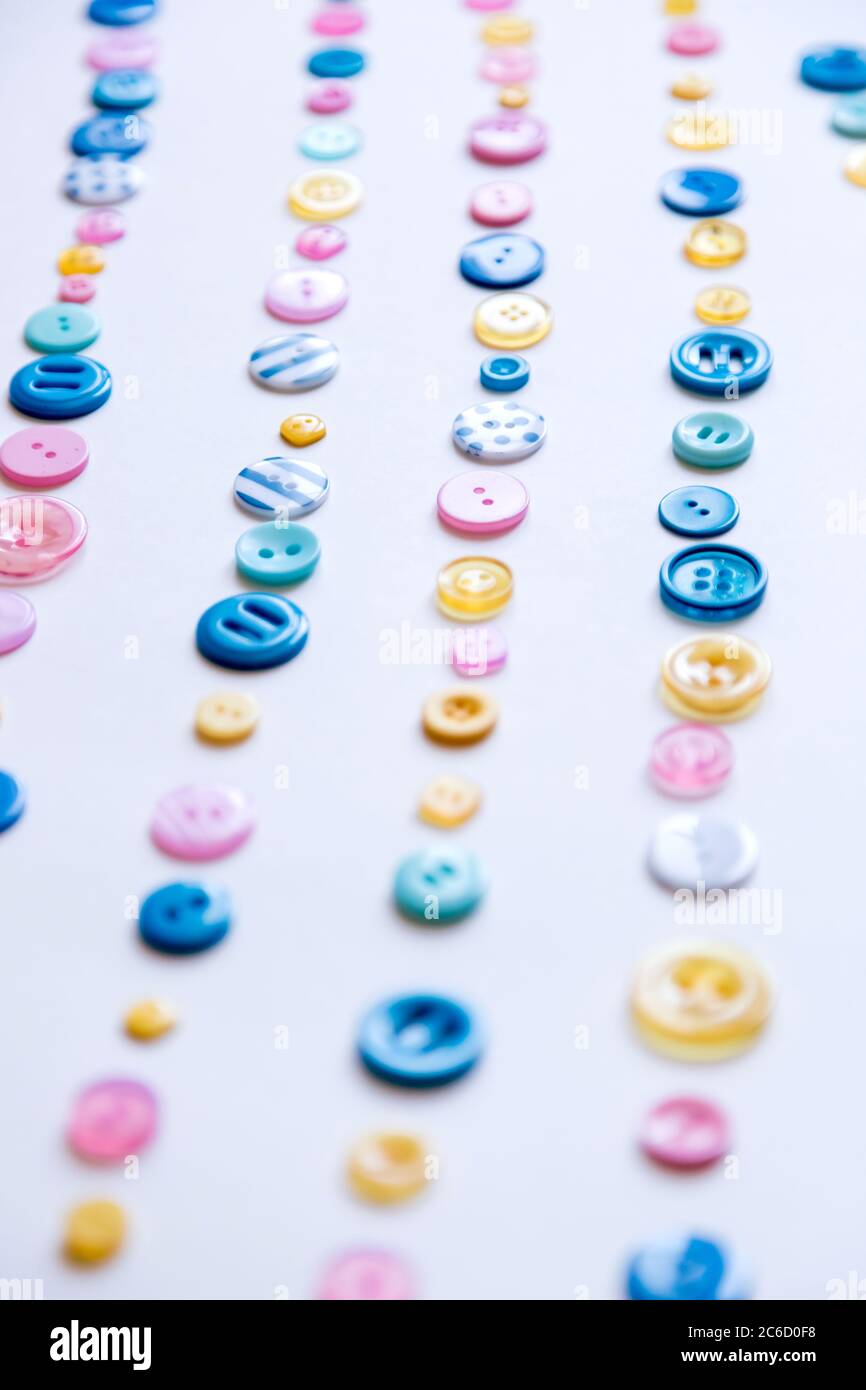 Flat lay with colorful sewing buttons, mock up, top view Stock Photo ...