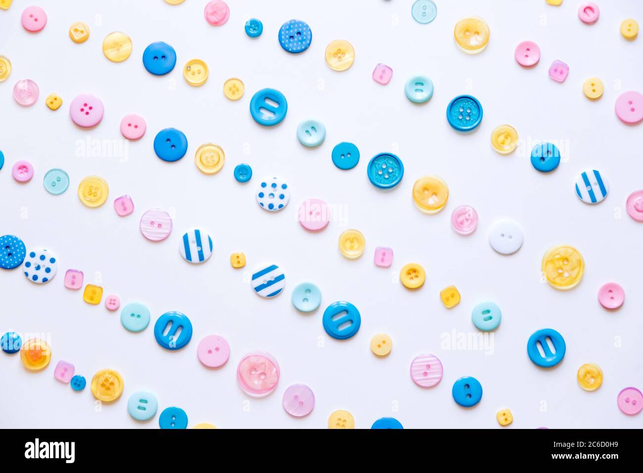 Flat lay with colorful sewing buttons, mock up, top view Stock Photo ...