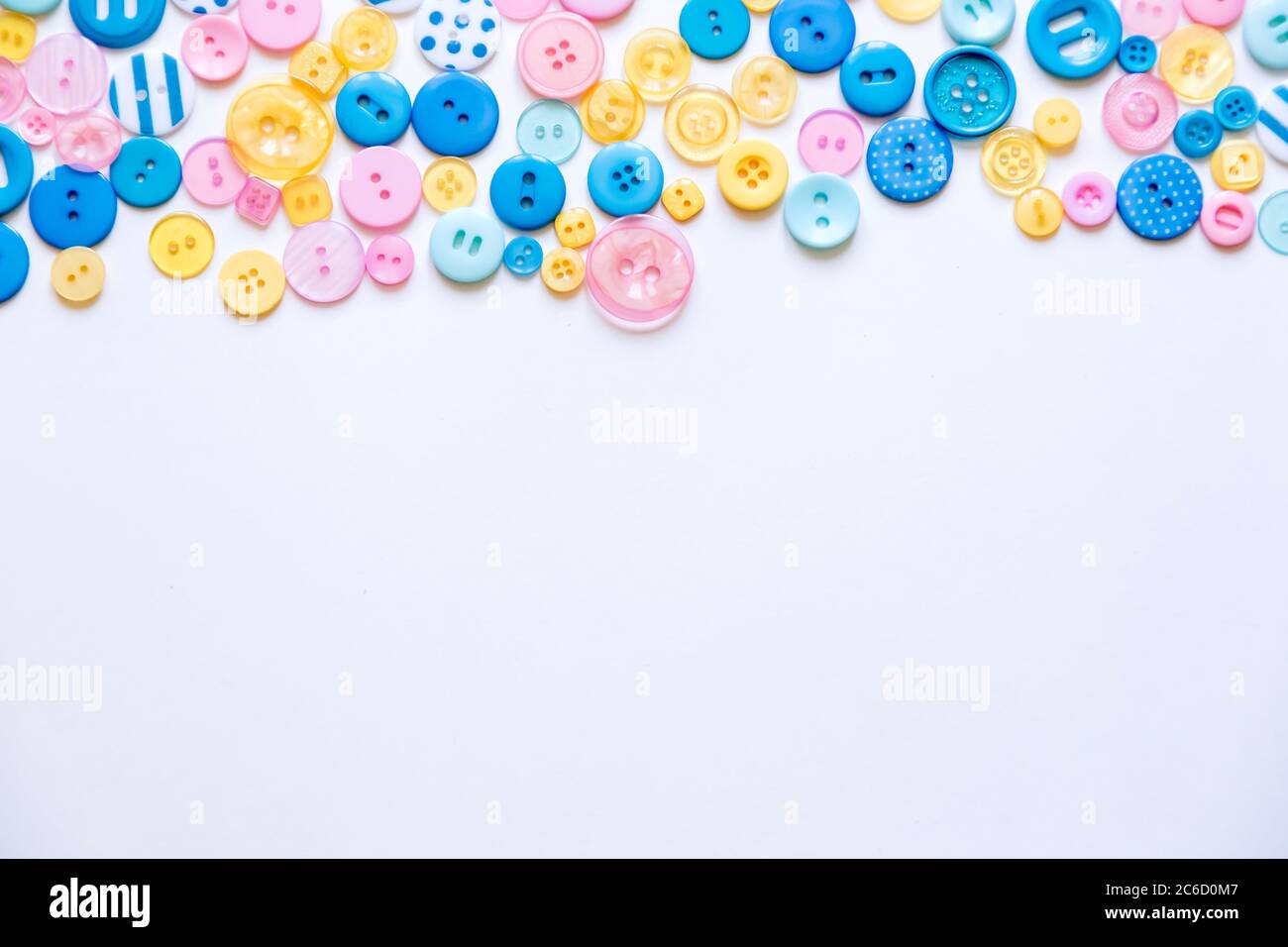 Flat lay with colorful sewing buttons, mock up, top view Stock Photo ...