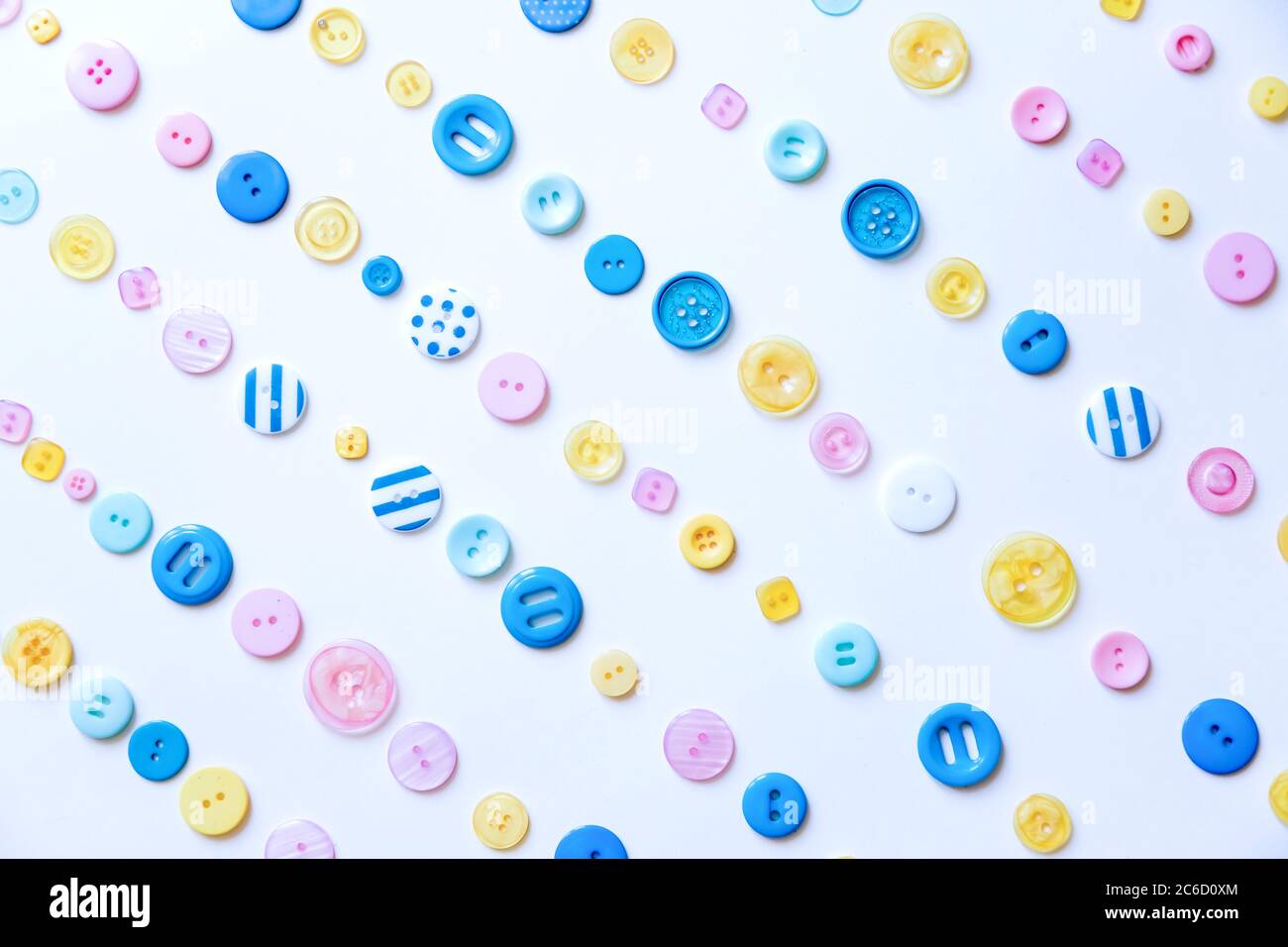 Flat lay with colorful sewing buttons, mock up, top view Stock Photo ...