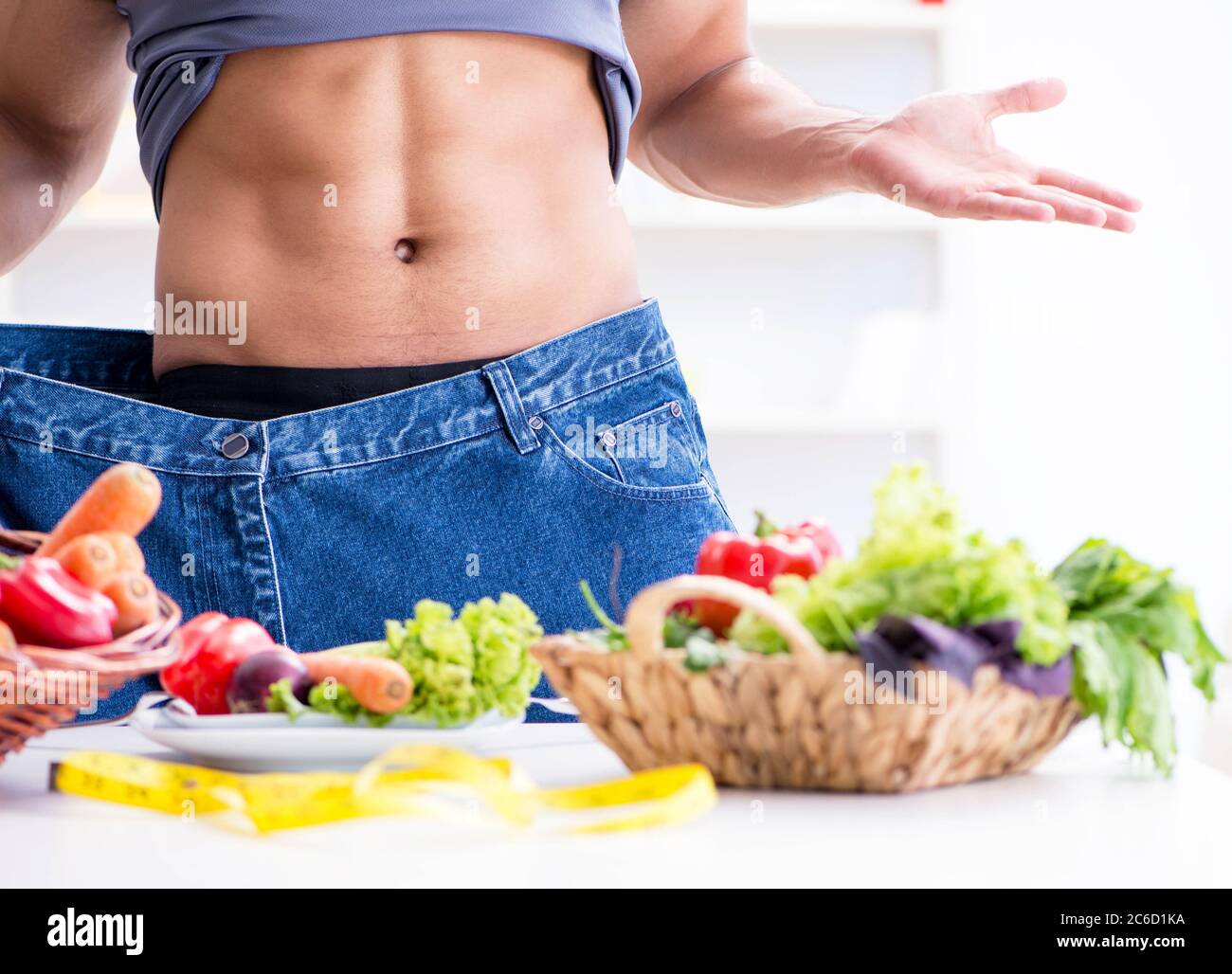 The young man in healthy eating and dieting concept Stock Photo - Alamy
