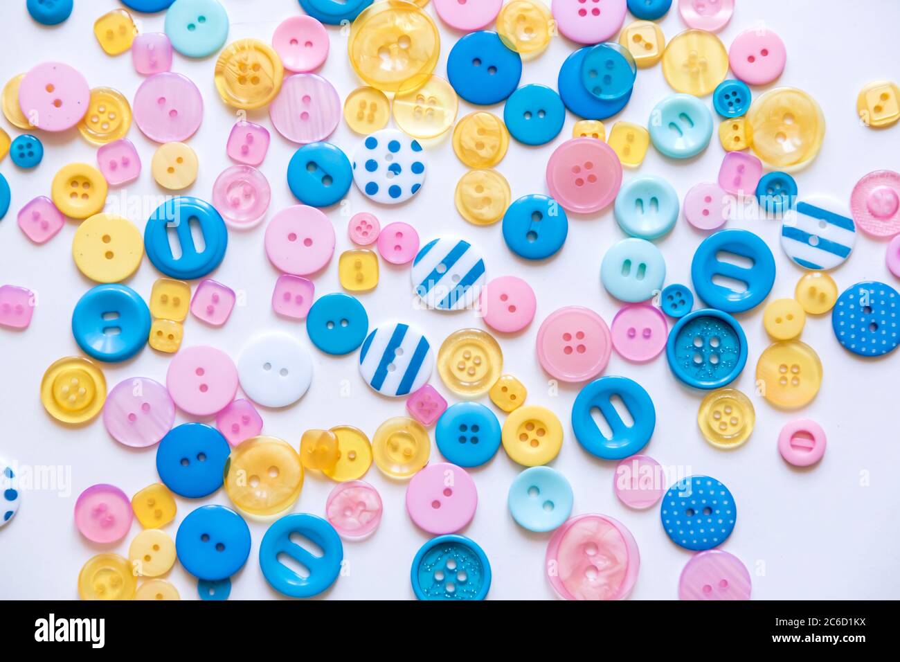Flat lay with colorful sewing buttons, mock up, top view Stock Photo ...