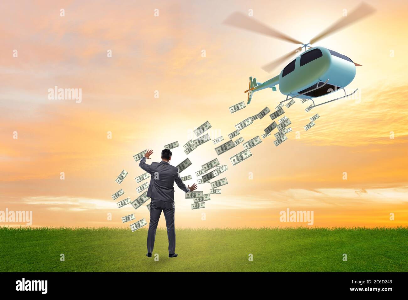 Helicopter money concept with the businessman Stock Photo - Alamy