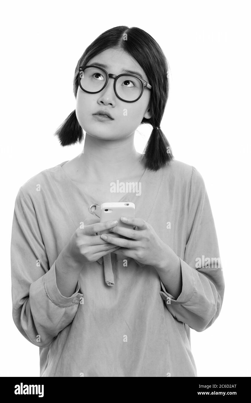 Woman holding glasses looking Black and White Stock Photos & Images - Alamy