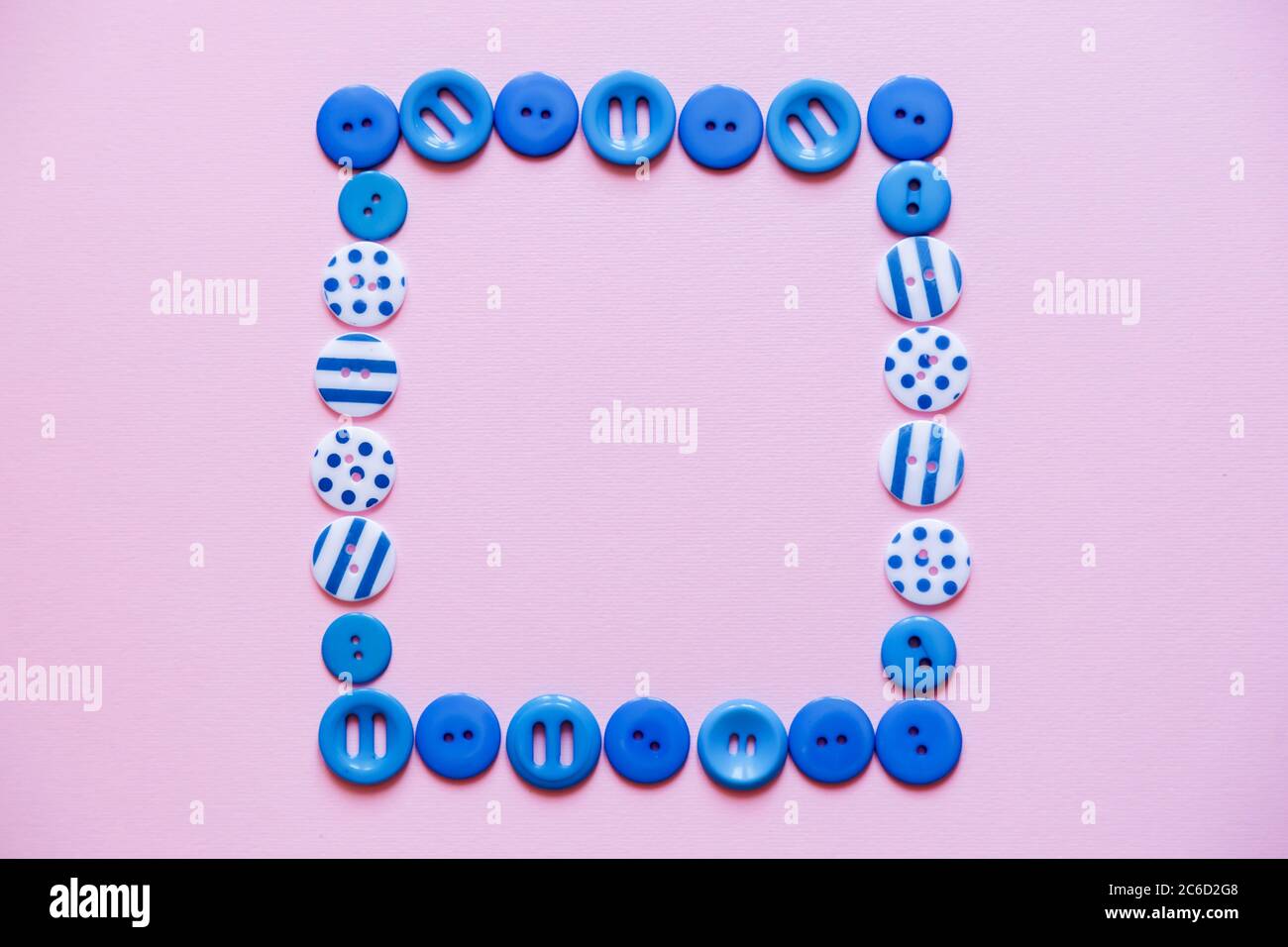 Flat lay with colorful sewing buttons, mock up, top view Stock Photo ...