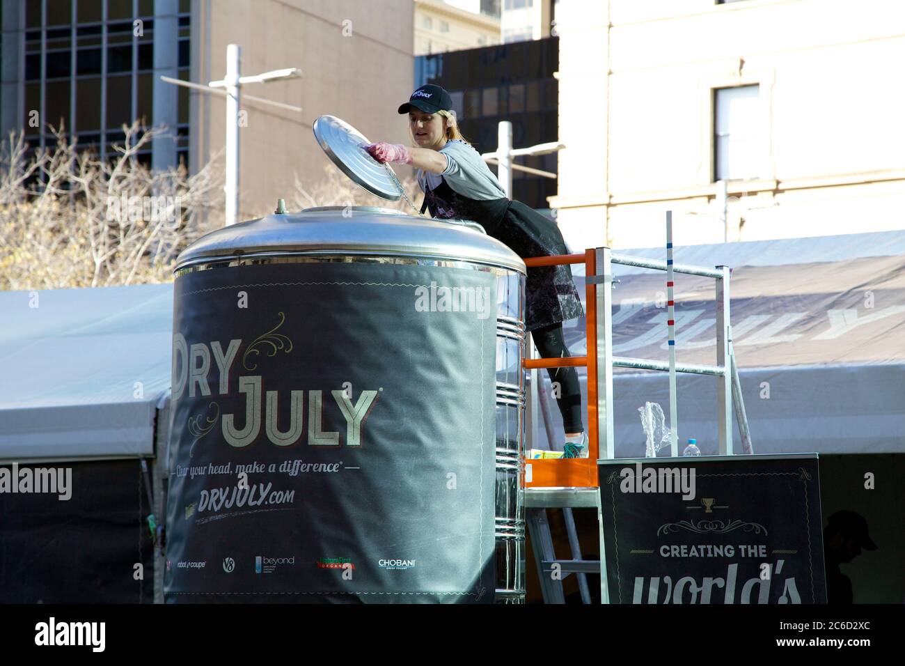 The lid of the giant vat is removed in order to start pouring in the ...
