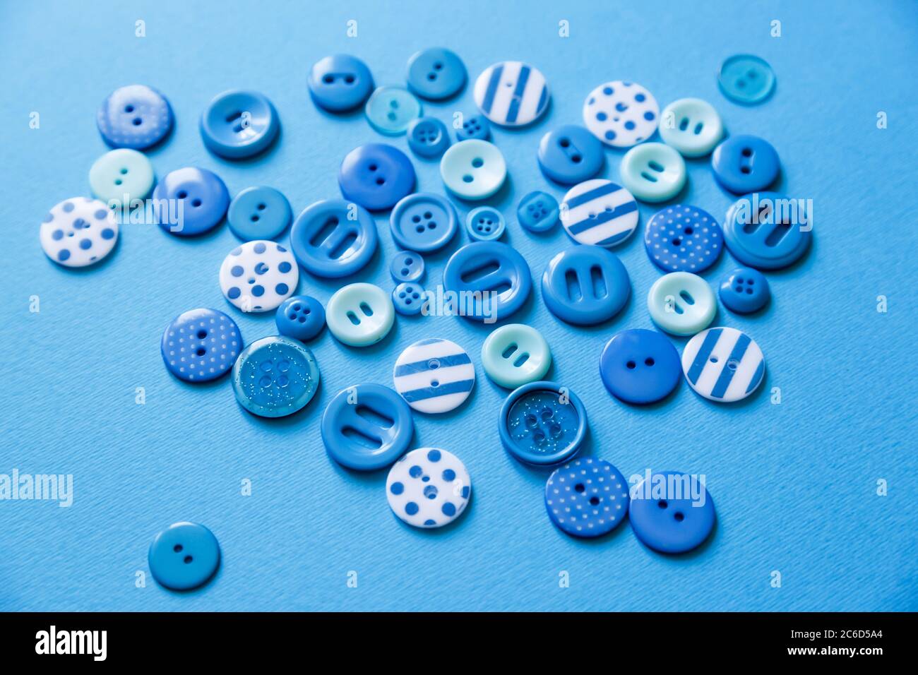 Flat lay with colorful sewing buttons, mock up, top view Stock Photo ...