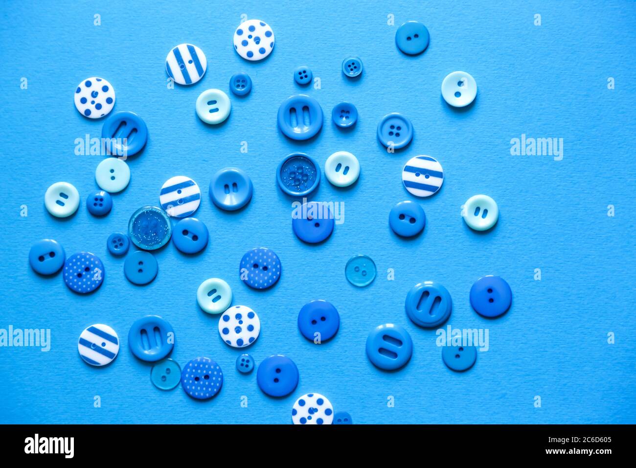 Flat lay with colorful sewing buttons, mock up, top view Stock Photo ...
