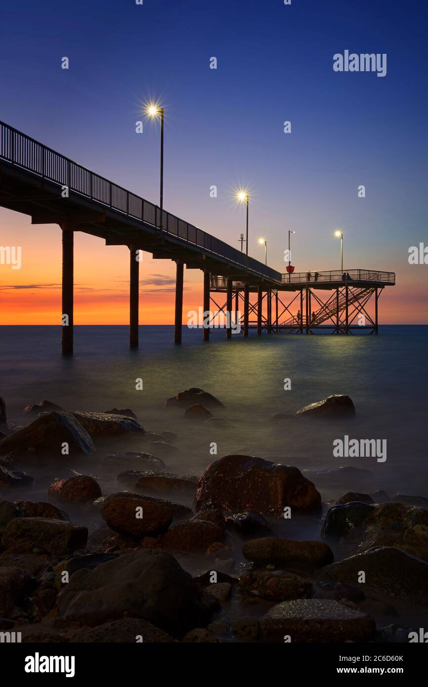 Jetty at sunset Stock Photo - Alamy