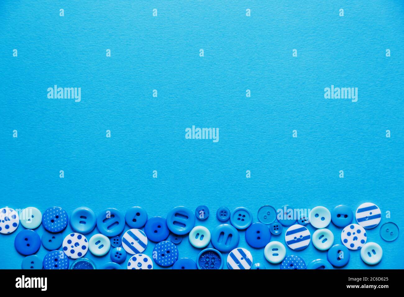 Flat lay with colorful sewing buttons, mock up, top view Stock Photo ...