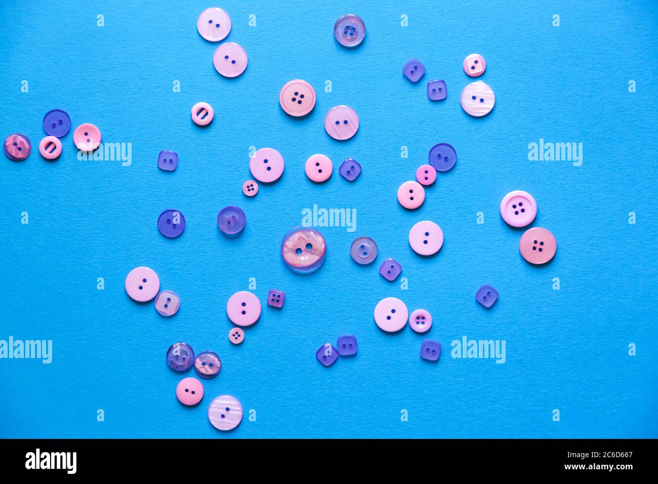 Flat lay with colorful sewing buttons, mock up, top view Stock Photo ...
