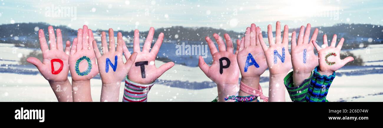 Kids Hands Holding Word Do Not Panic, Snowy Winter Background Stock ...