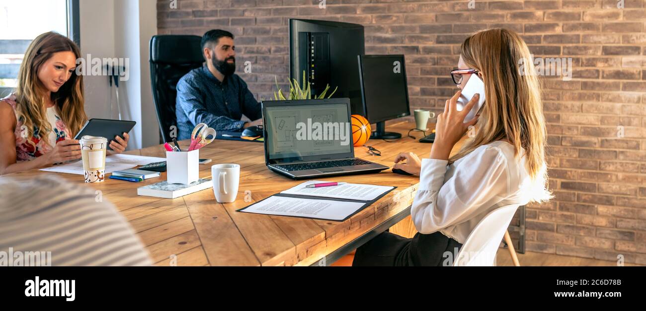 People working in a coworking office Stock Photo - Alamy