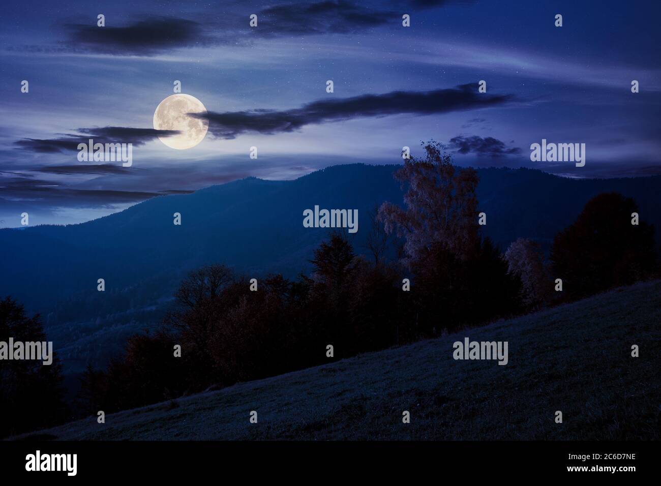 autumnal rural landscape at night. beautiful countryside in mountains ...