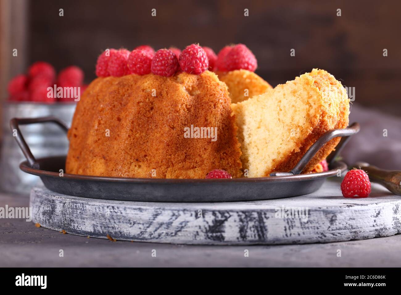 round cake with fresh raspberries for dessert Stock Photo - Alamy