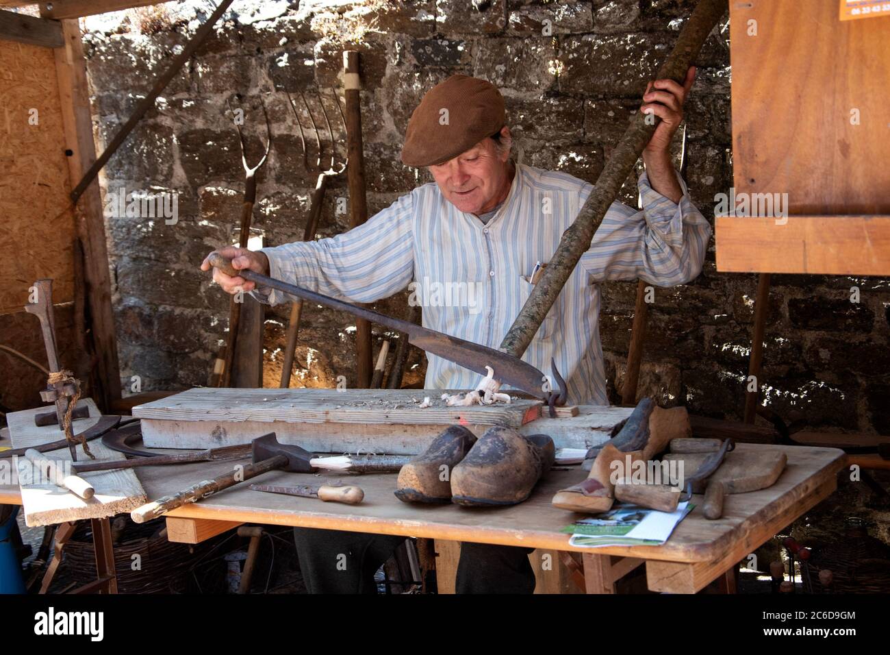 Senior artisan showing his art at carpentry workshop at traditional ...