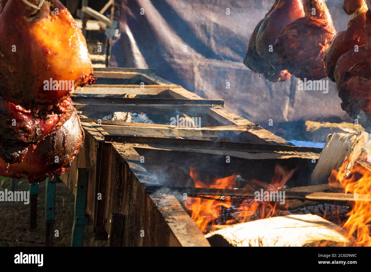 Pig cooking over open fire hi-res stock photography and images - Alamy