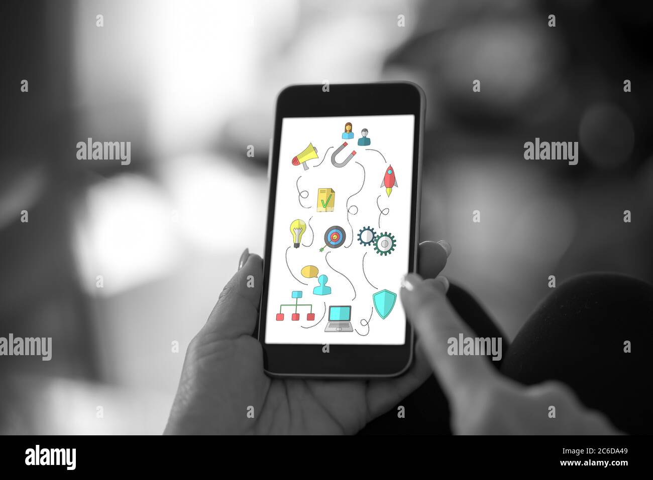 Hand holding a smartphone with business strategy concept Stock Photo ...