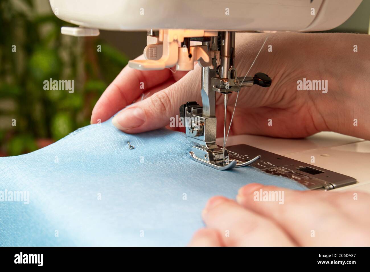 Making a dress sewing machine hi-res stock photography and images - Alamy