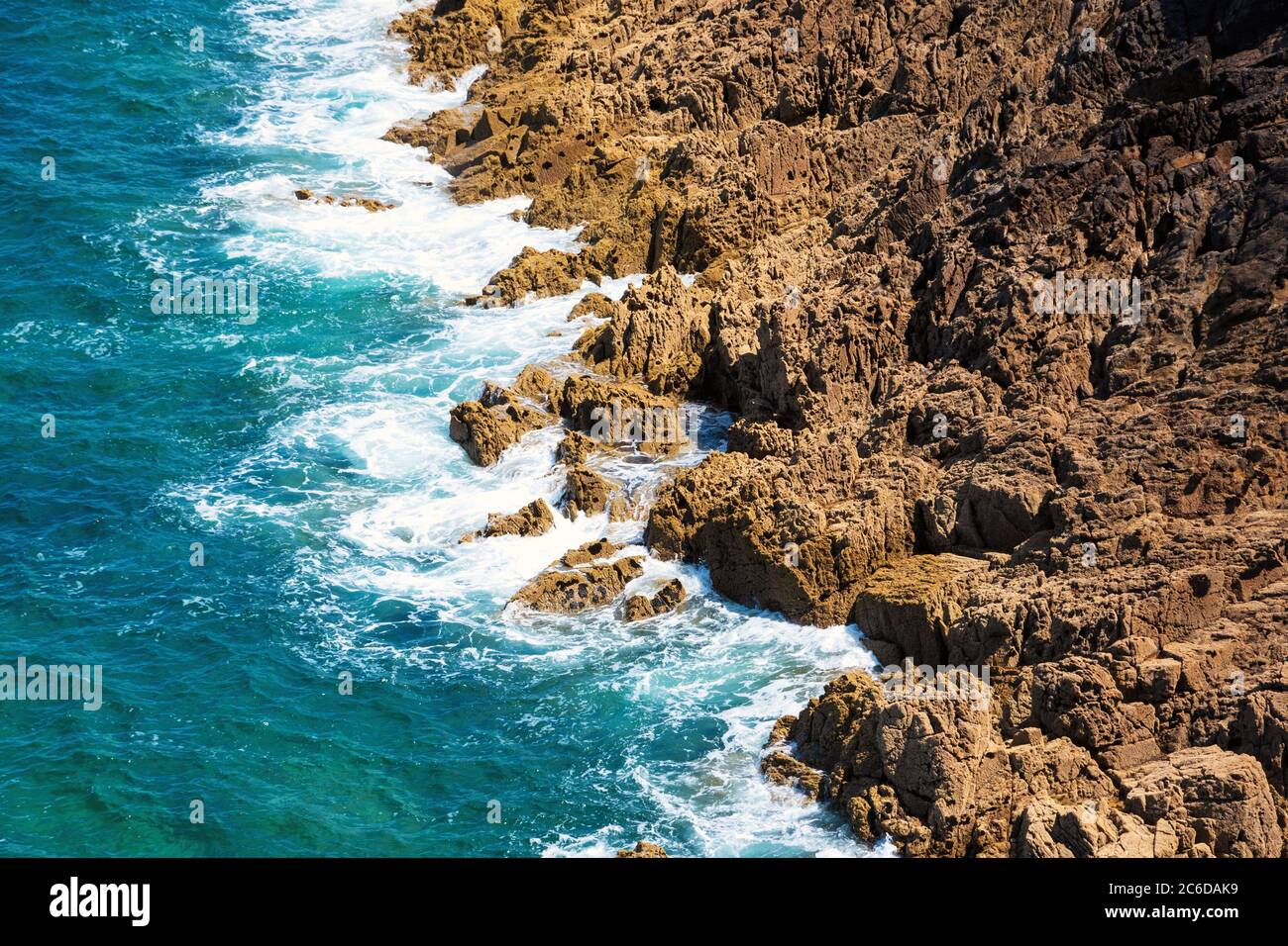 Emerald coast in Brittany (France). Sharp rocks and waves background ...