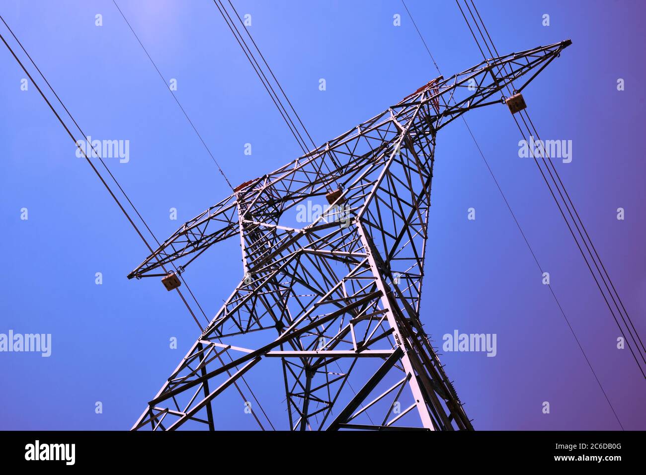 Power line metal pylon with high voltage cables Stock Photo - Alamy