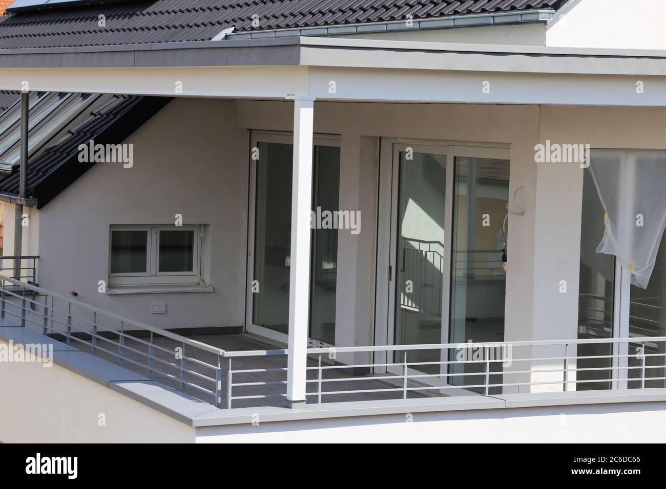 Large balcony on a new residential house Stock Photo - Alamy