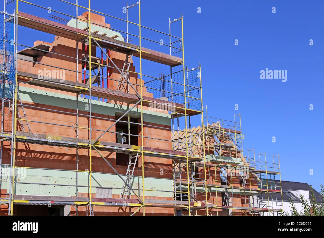 Building site with a detached house under construction Stock Photo - Alamy