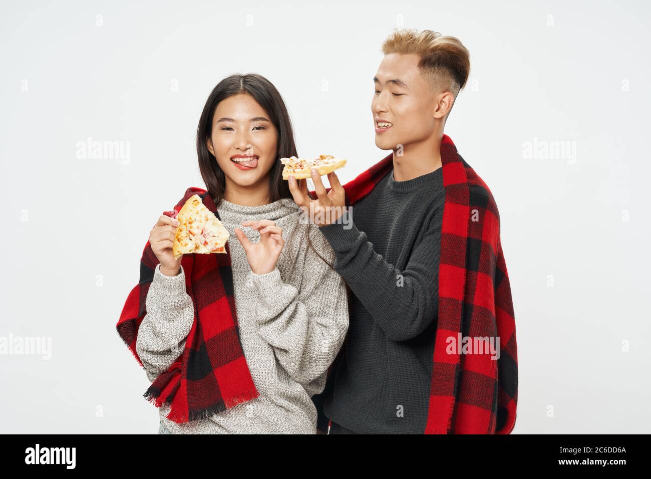 Young woman holding pizza model hi-res stock photography and images - Alamy