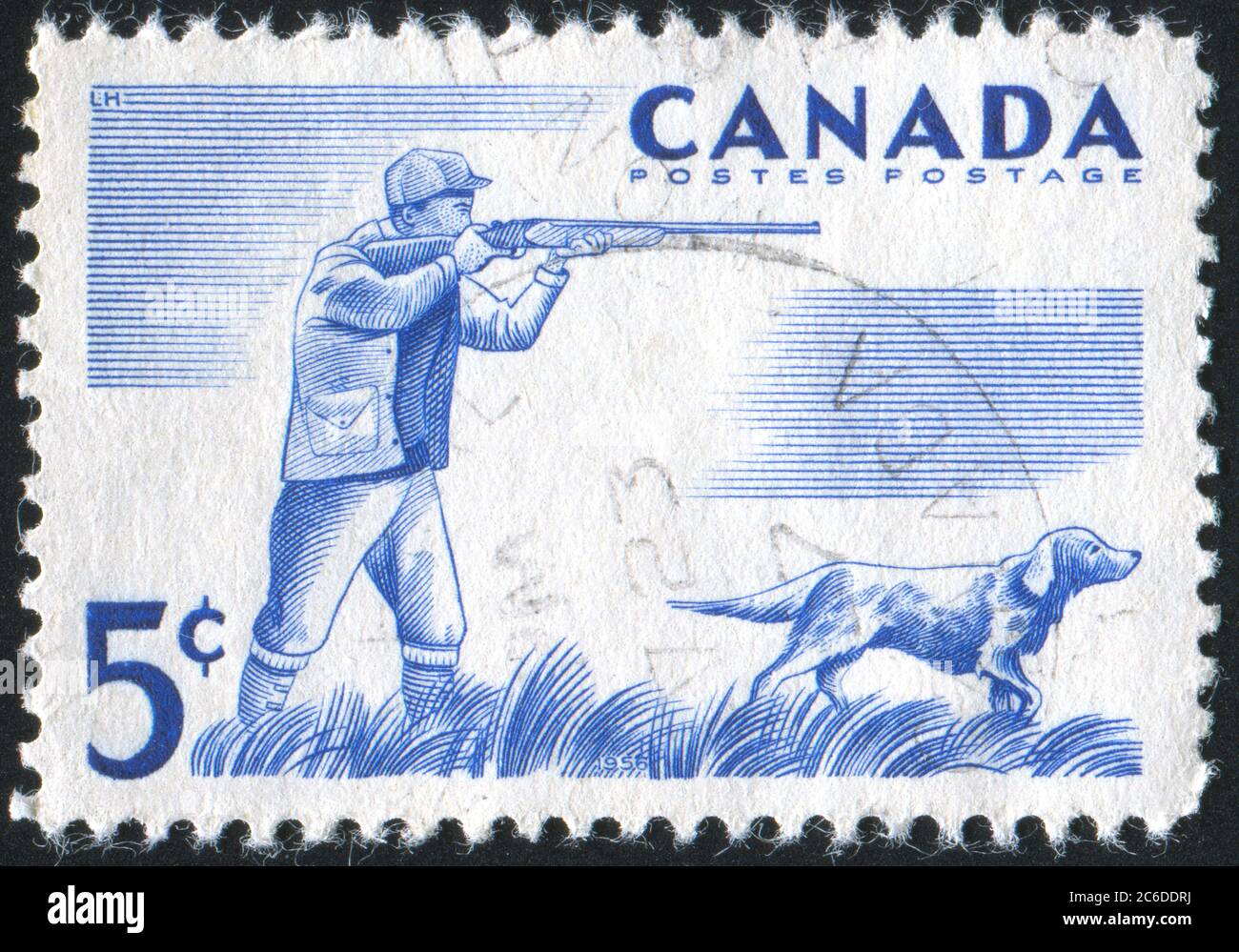 CANADA - CIRCA 1957: stamp printed by Canada, shows Hunter and dog ...