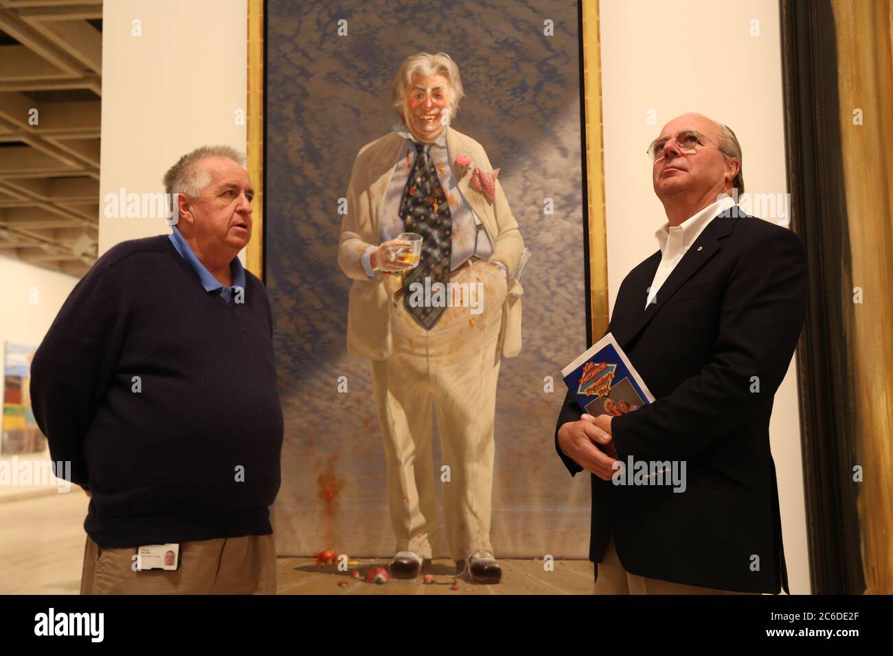 Art Gallery of NSW head storeman Steve Peters (L) and artist Tim ...
