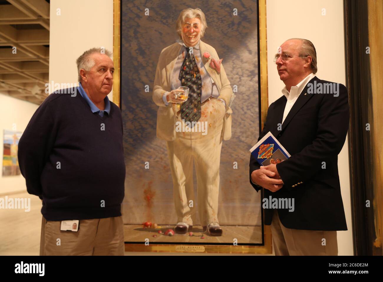 Art Gallery of NSW head storeman Steve Peters (L) and artist Tim ...